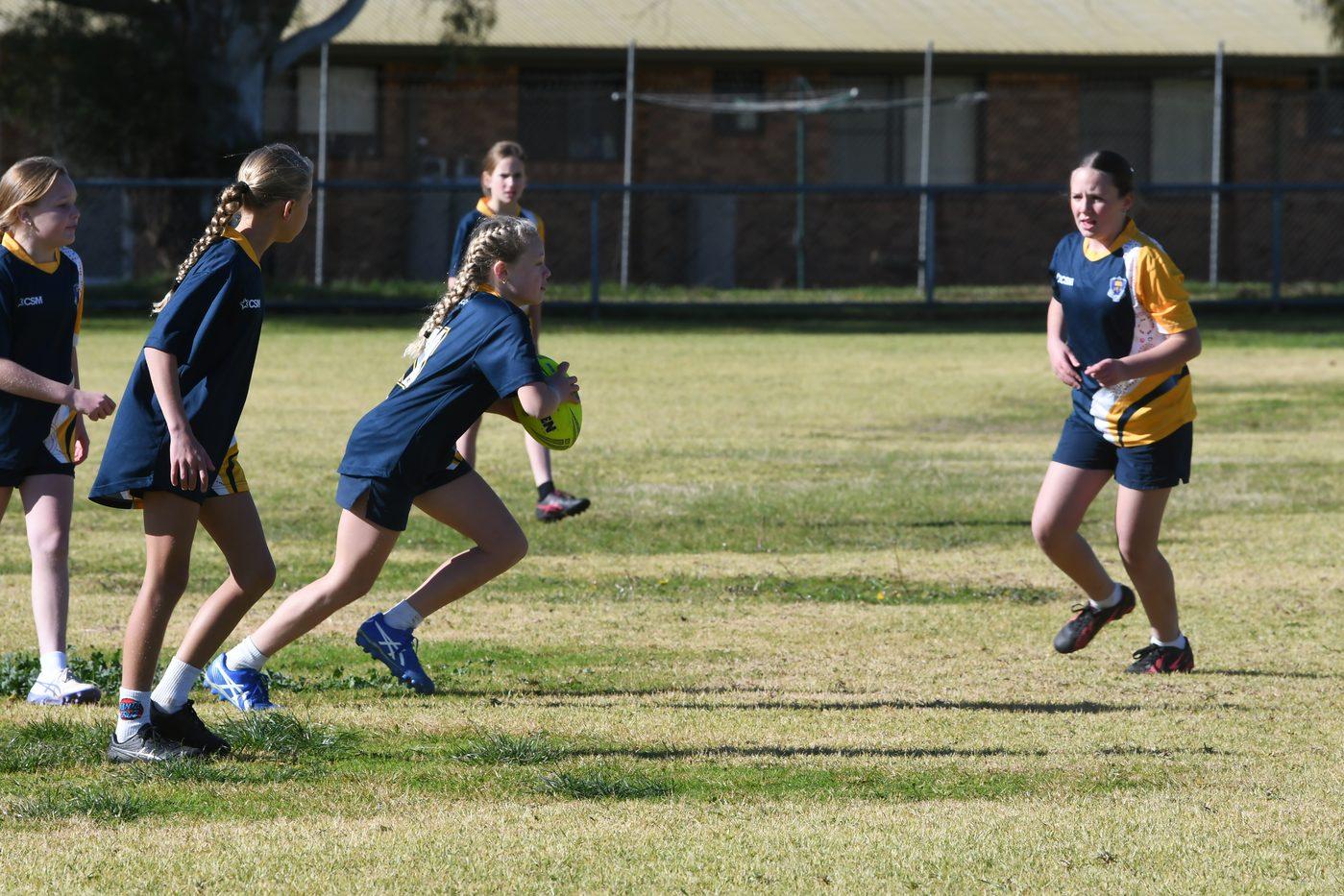 Schools compete in touch footy comp